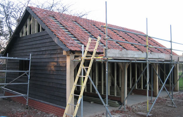 Timber Frame Garage Construction - Roger Gladwell Timber Frame Construction